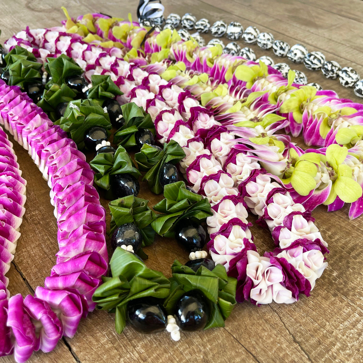 Fresh Hawaiian Orchid Leis delivered Nationwide. Lowest prices!